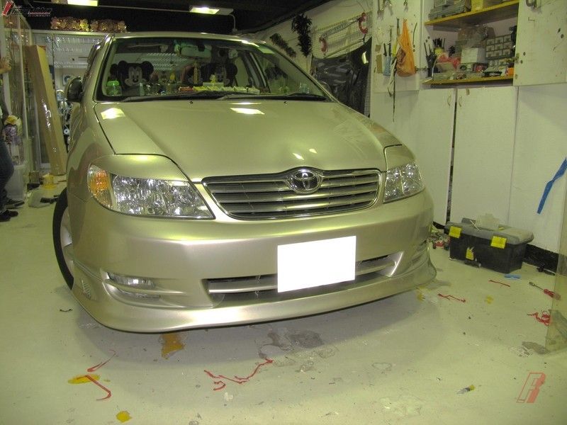 Toyota 2002 Corolla NZE121 T001L front spoiler lip - Faithful Rainbow